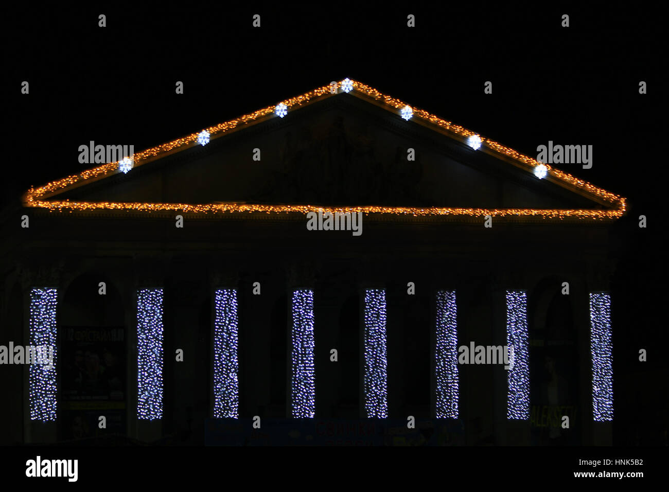 decorated with illuminations from multicolored lights on the building ...