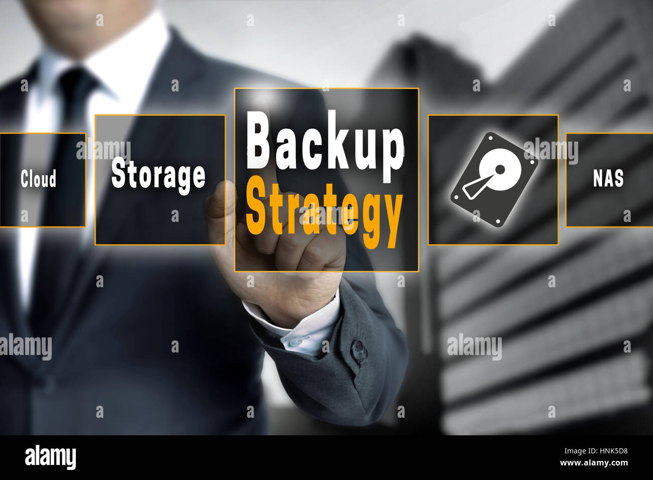 Backup Strategy touchscreen is operated by a businessman Stock Photo ...