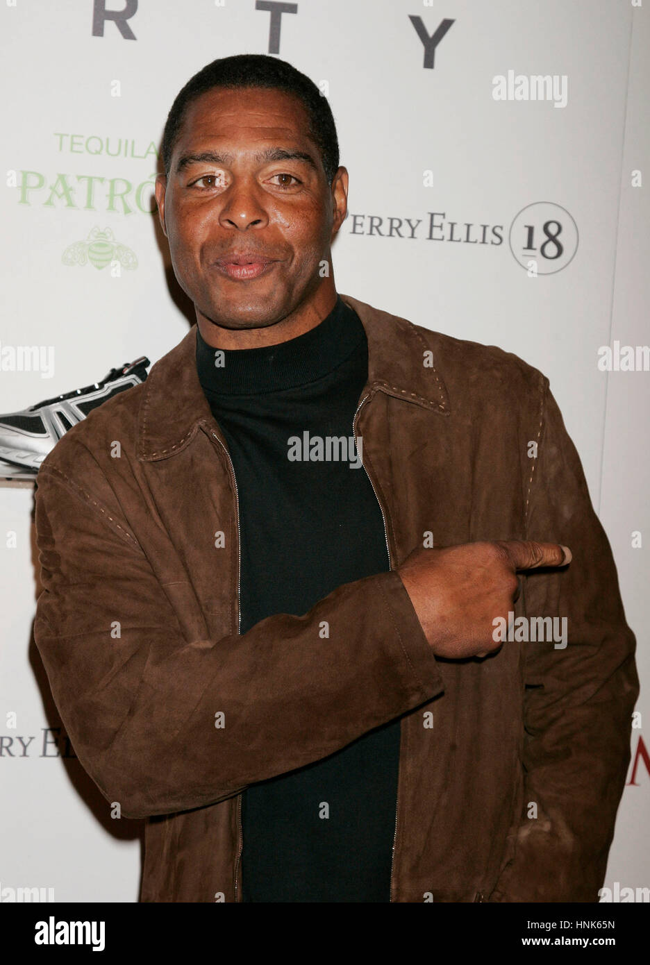 Marcus Allen arrives at the Maxim Super Bowl party at the Stone Rose at ...
