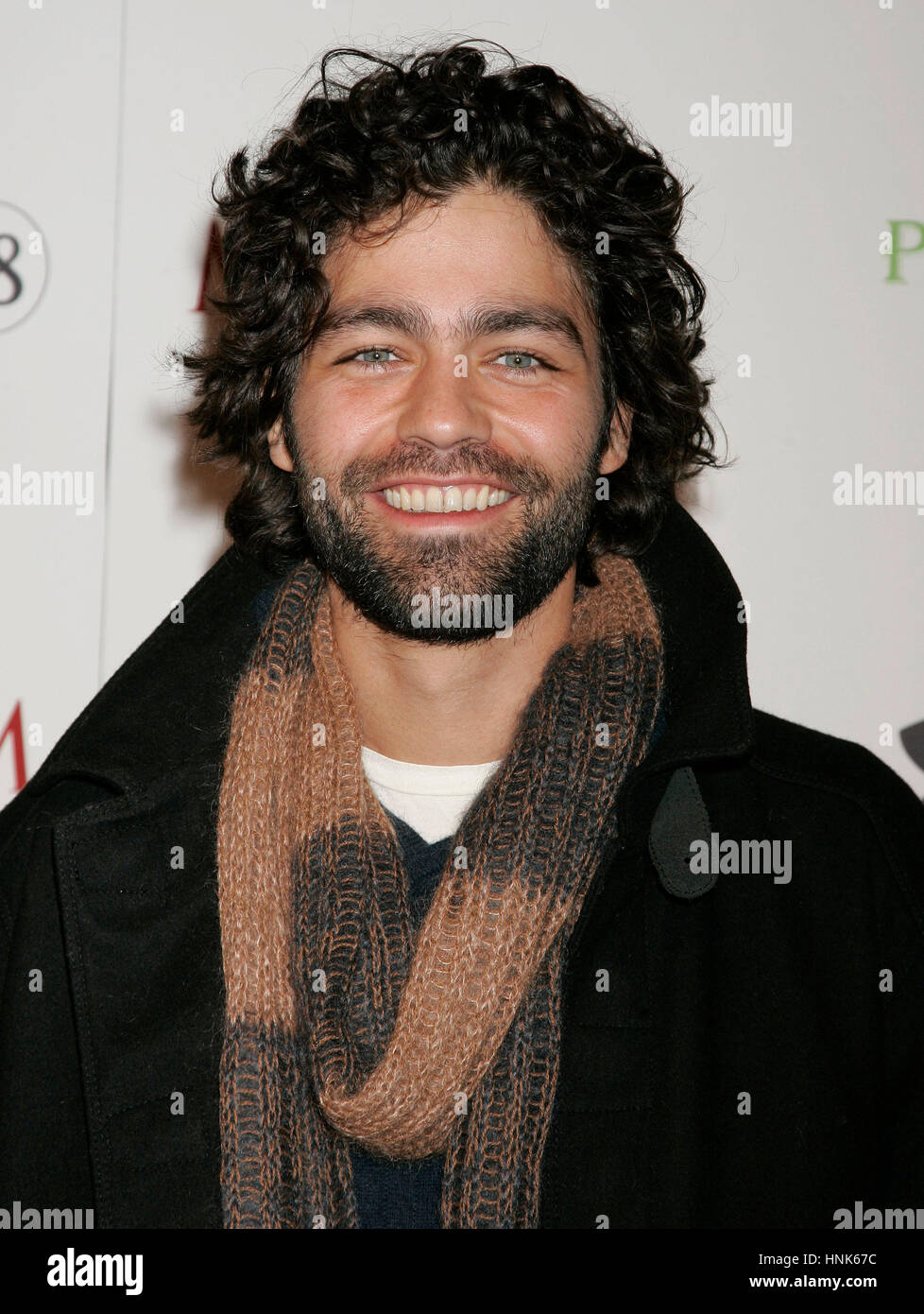 Adrian Grenier arrives at the Maxim Super Bowl party at the Stone Rose ...