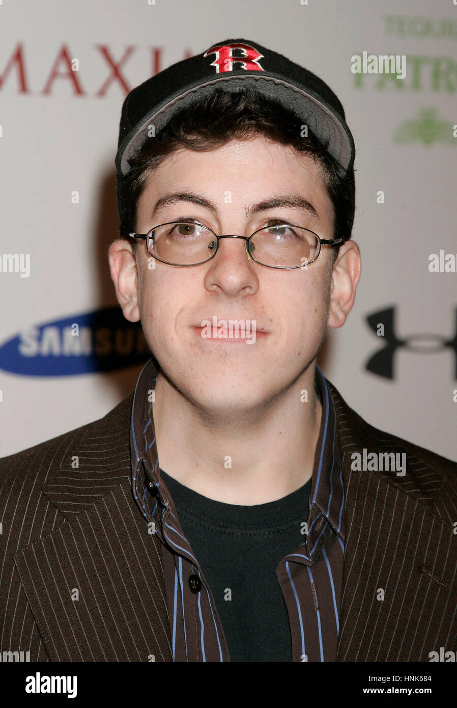 Christopher Mintz-Plasse arrives at the Maxim Super Bowl party at the ...