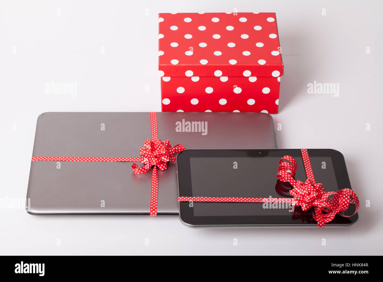 The new mobile phone on the table as a gift Stock Photo - Alamy
