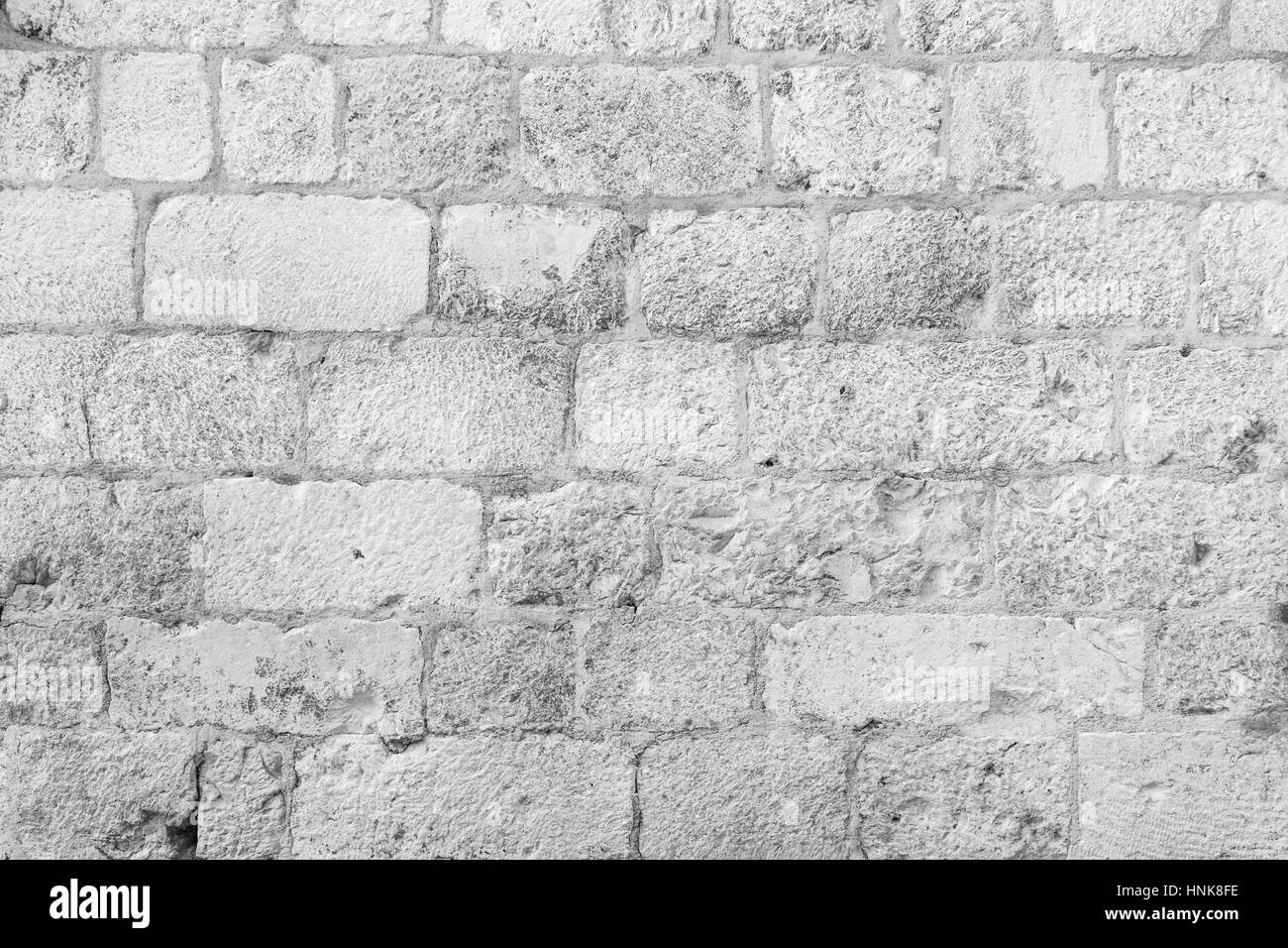 Old, aged and dirty brick wall texture in black&white Stock Photo - Alamy