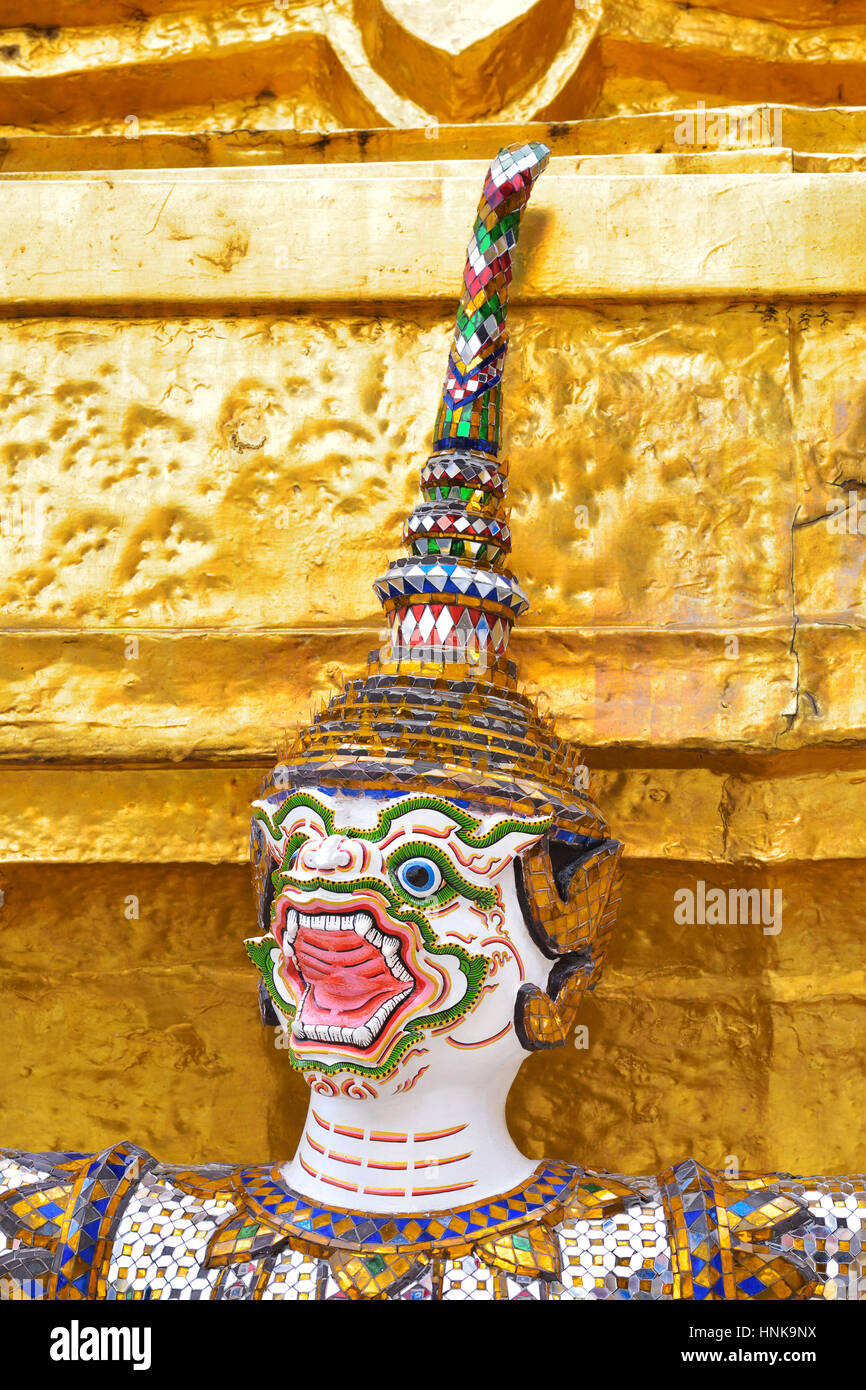 closeup face and headdress of Yak(giant) statue at Wat Phra Kaew in ...