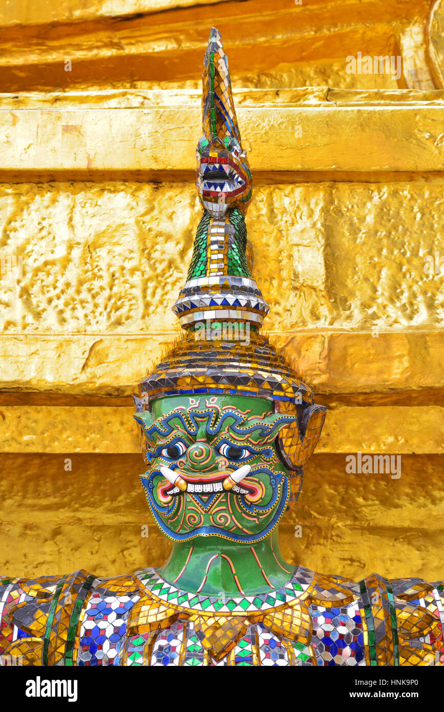 closeup face and headdress of Yak(giant) statue at Wat Phra Kaew in ...