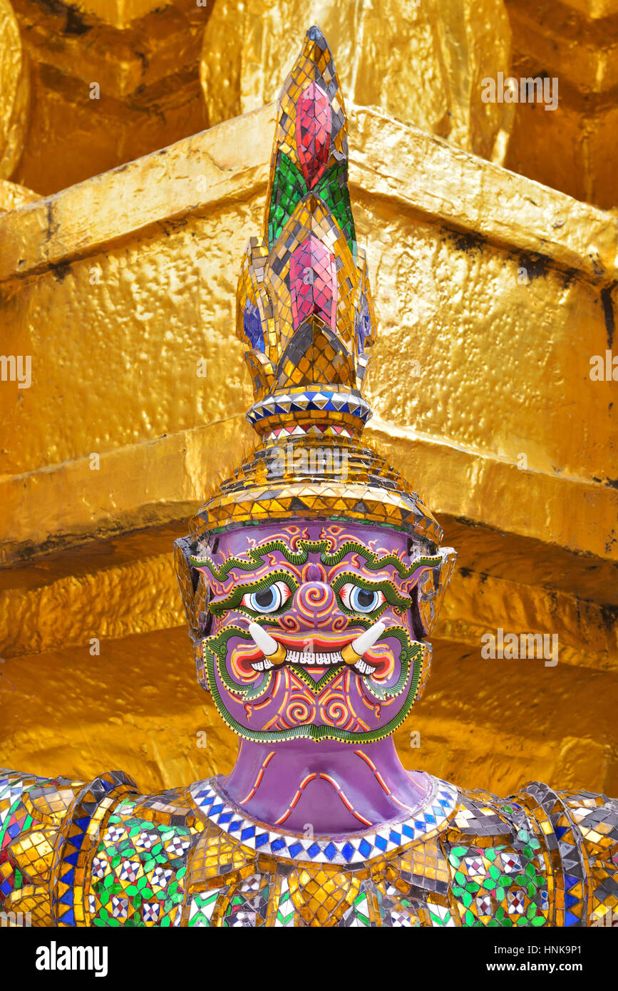 closeup face and headdress of Yak(giant) statue at Wat Phra Kaew in ...