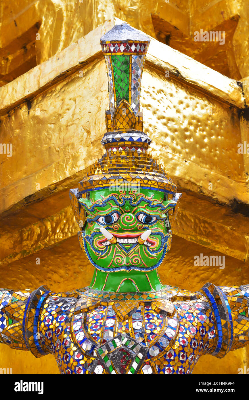 closeup face and headdress of Yak(giant) statue at Wat Phra Kaew in ...