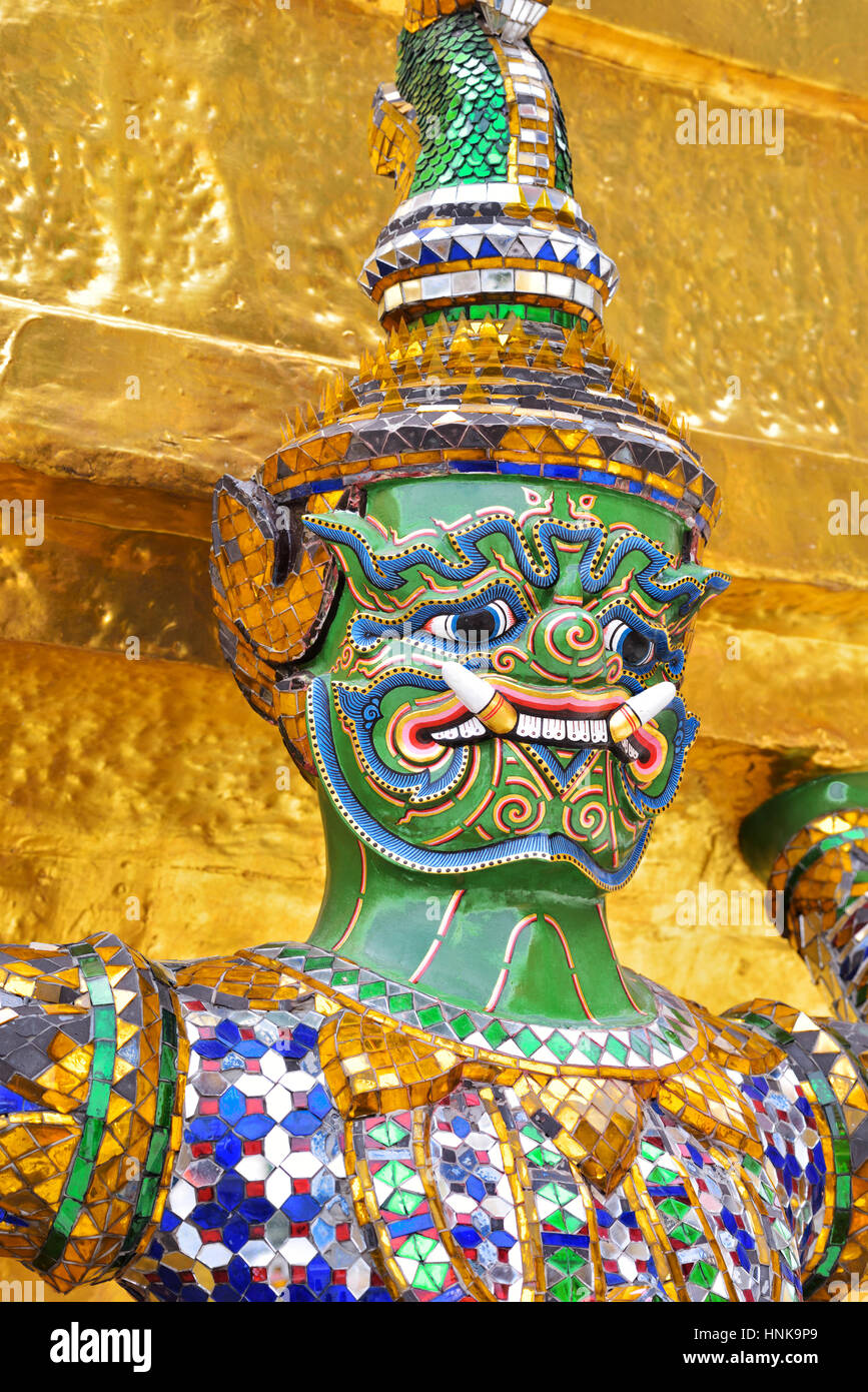 closeup face of Yak(giant) statue at Wat Phra Kaew in Bangkok, Thailand ...