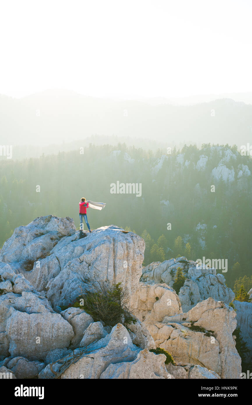 Female standing cliff top hi-res stock photography and images - Alamy