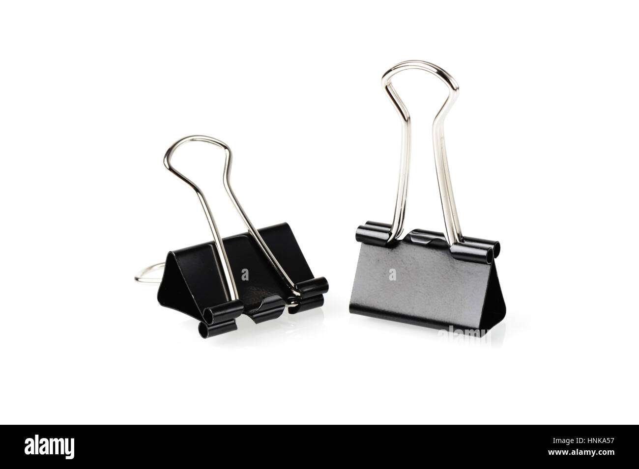 black binder clips isolated on white background Stock Photo - Alamy