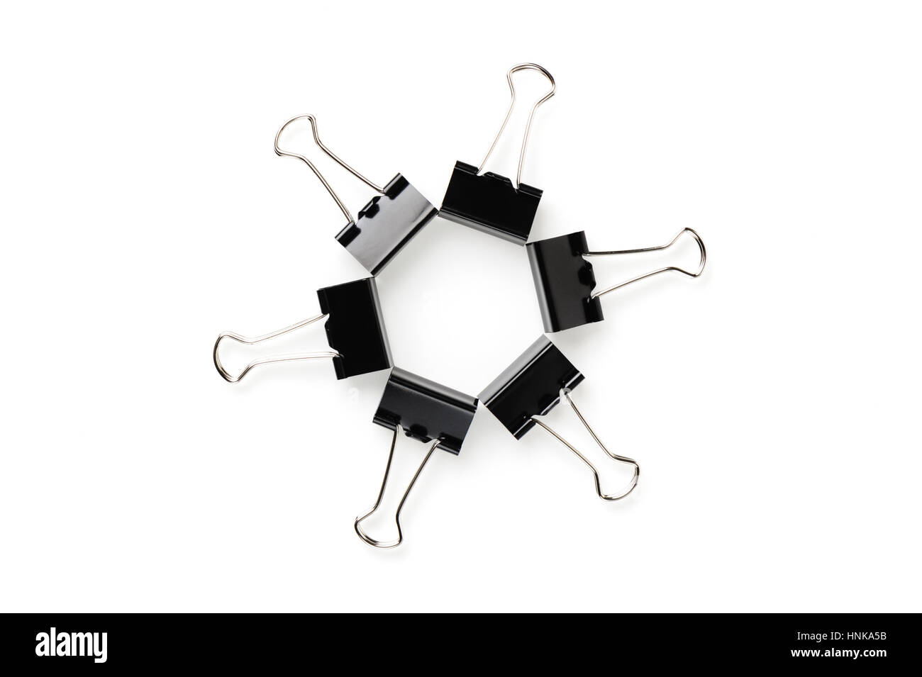 black binder clips isolated on white background Stock Photo - Alamy