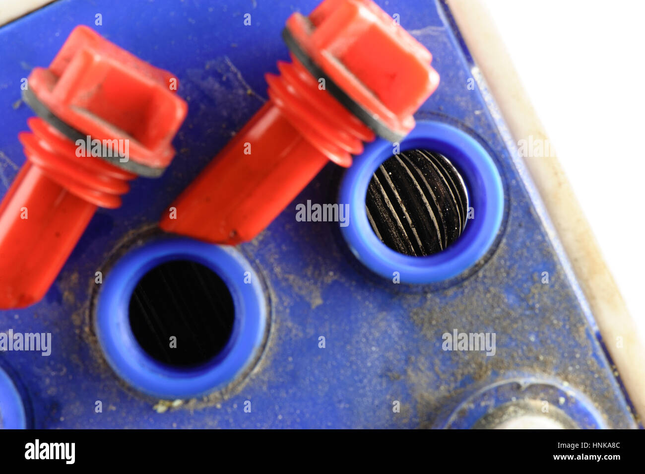 closeup water level inside old car battery Stock Photo - Alamy