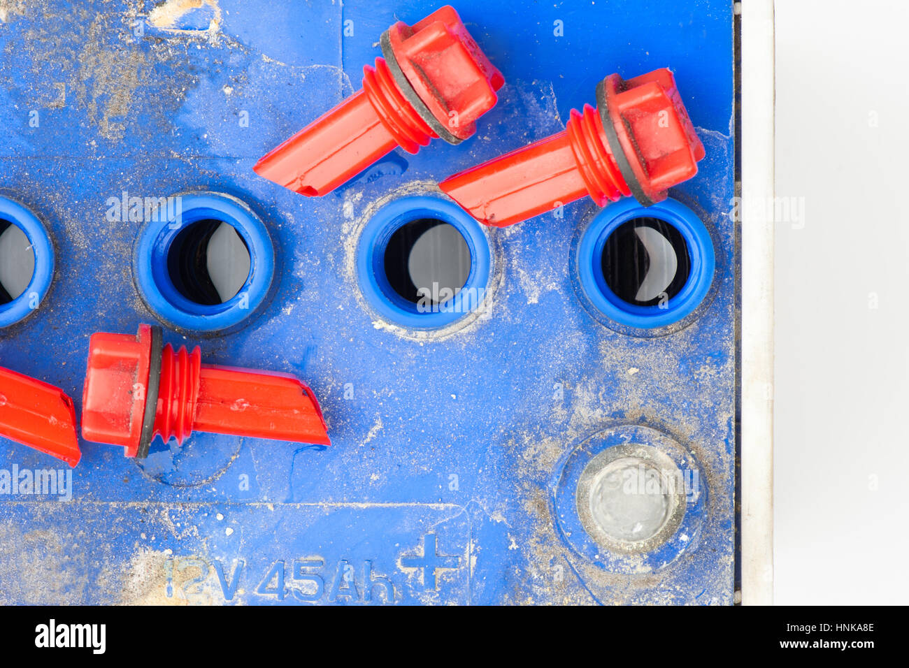 closeup water level inside old car battery Stock Photo - Alamy