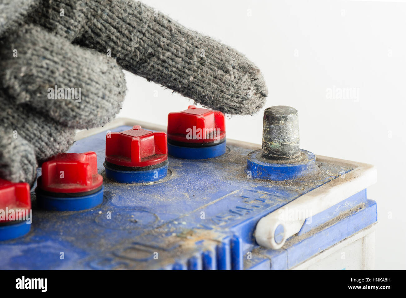 closeup old car battery on white background Stock Photo - Alamy
