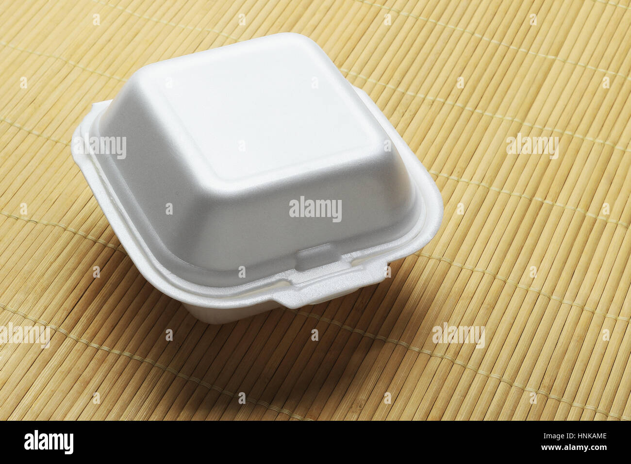 Styrofoam Takeaway Food Box on Bamboo Mat Background Stock Photo - Alamy