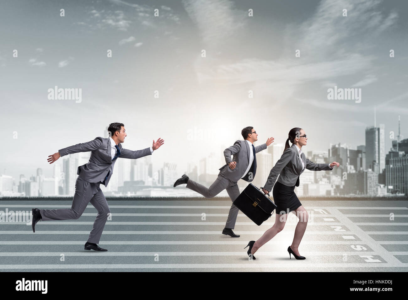 Businesspeople running in competition concept Stock Photo - Alamy