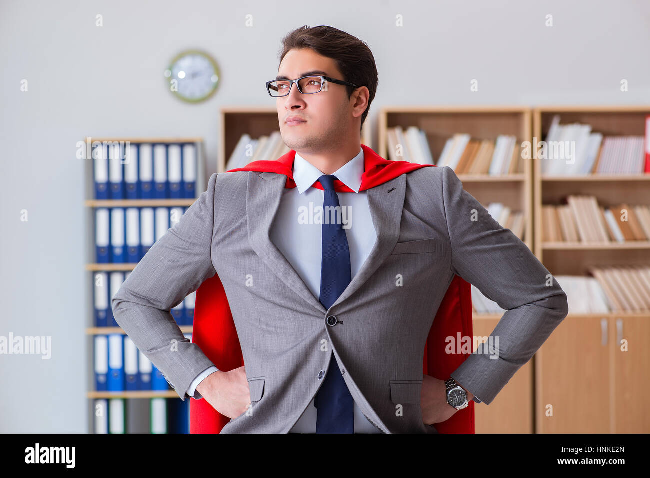 Superhero businessman working in the office Stock Photo - Alamy