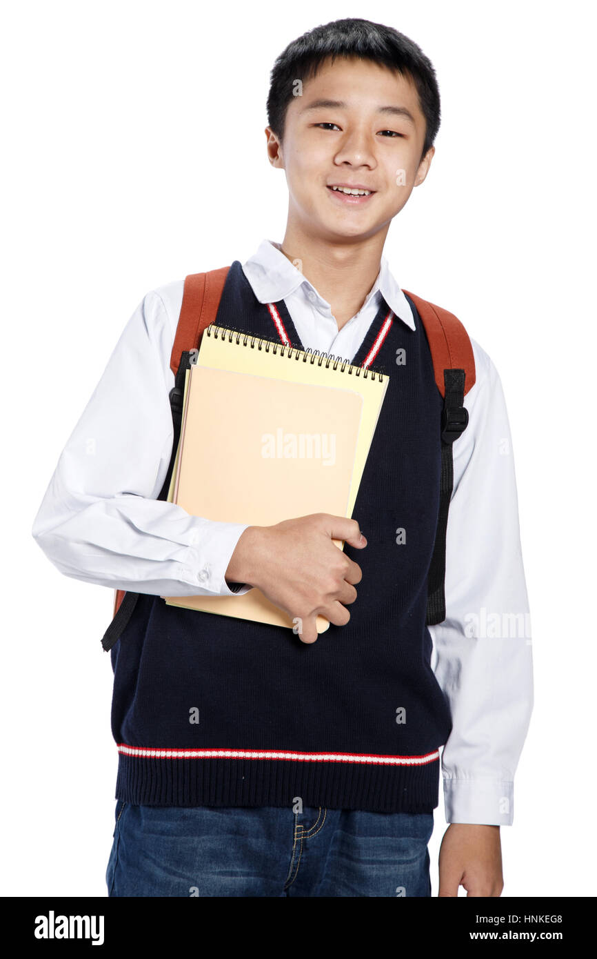 A middle school boy carrying a bag Stock Photo - Alamy