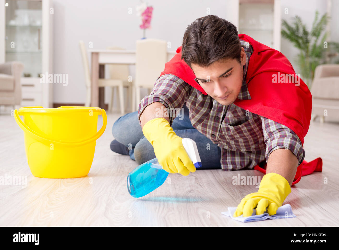 Super hero husband cleaning hi-res stock photography and images - Alamy