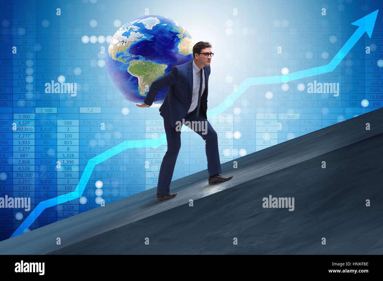 Businessman carrying earth on shoulders hi-res stock photography and ...