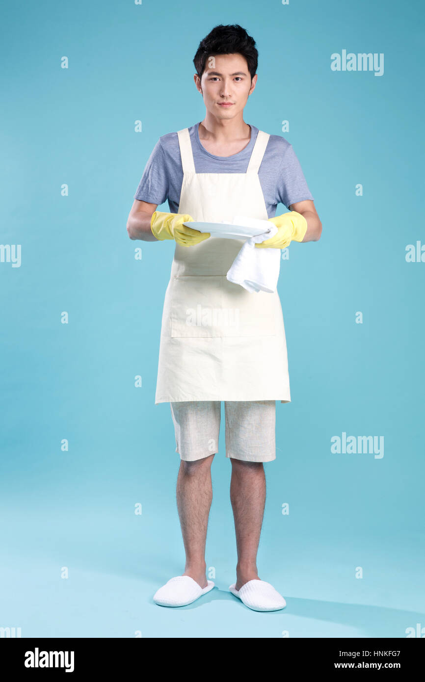 Young men do housework Stock Photo - Alamy