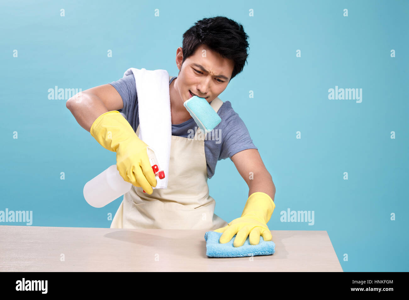 Young men do housework Stock Photo - Alamy