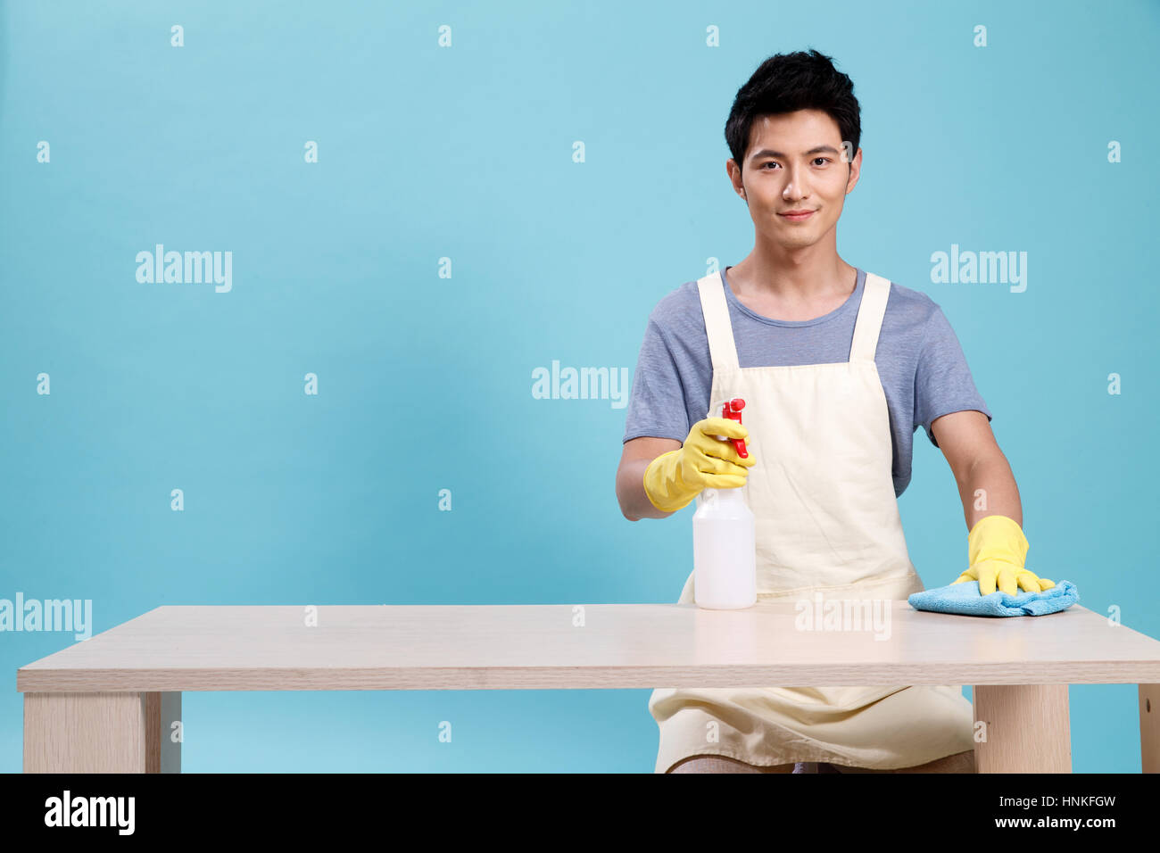 Young men do housework Stock Photo - Alamy