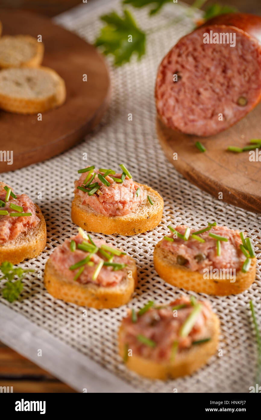 Pate with fresh baguette, appetizer snacks Stock Photo - Alamy