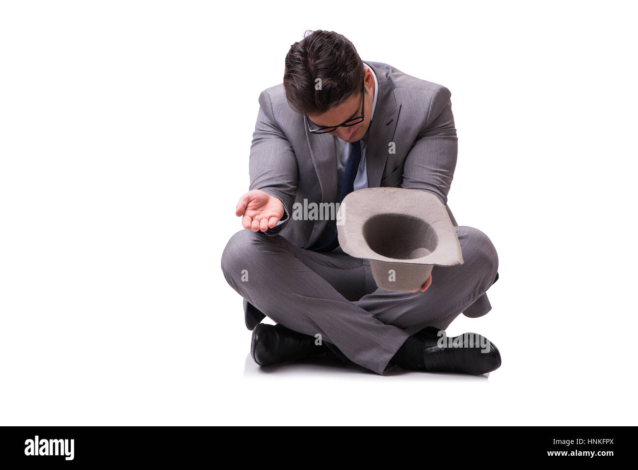 Bankrupt businessman isolated on white background Stock Photo - Alamy