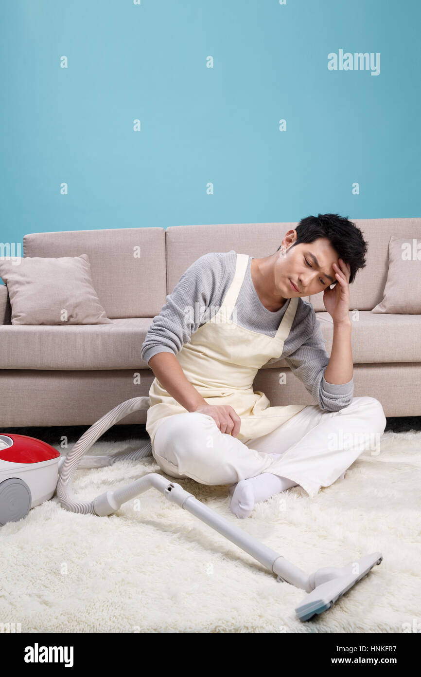 Young men do housework Stock Photo - Alamy