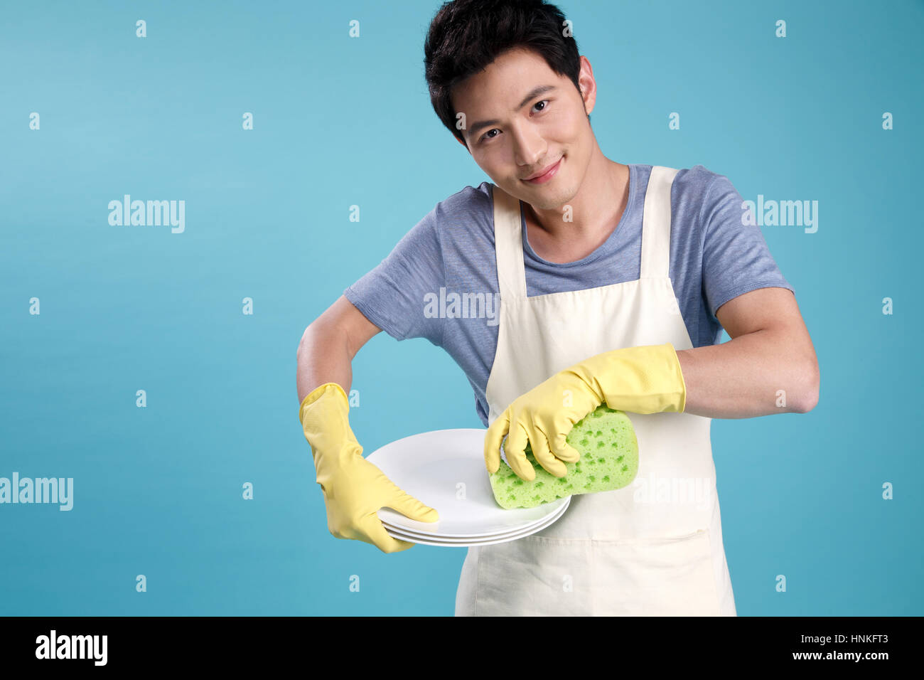 Young men do housework Stock Photo - Alamy