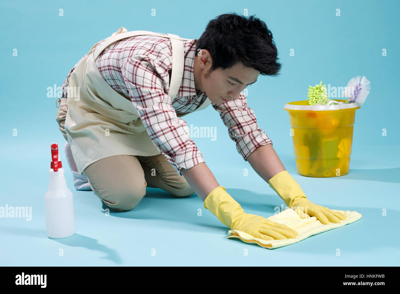 Young men do housework Stock Photo - Alamy