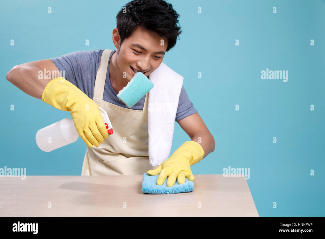 Young men do housework Stock Photo - Alamy