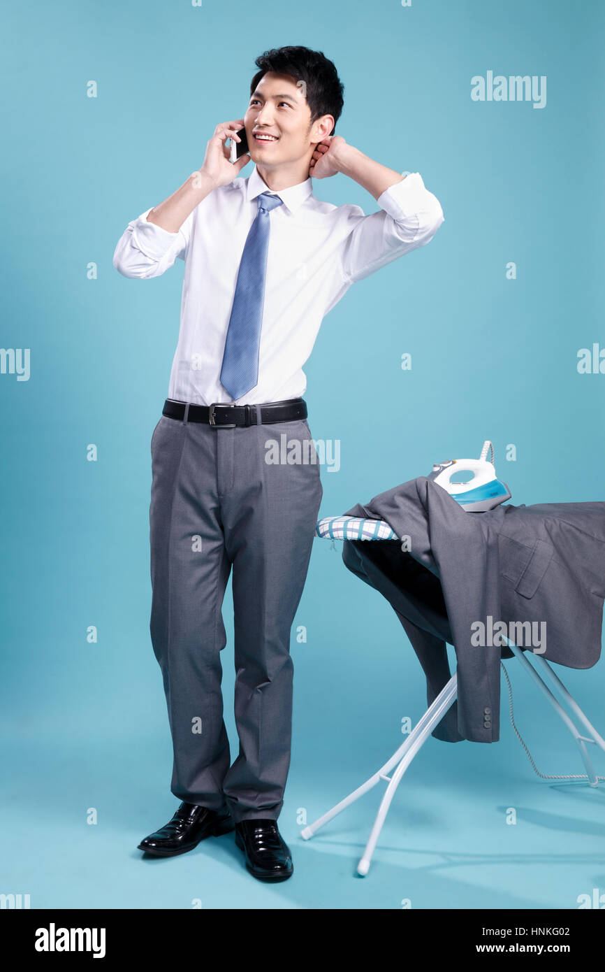 Young men do housework Stock Photo - Alamy