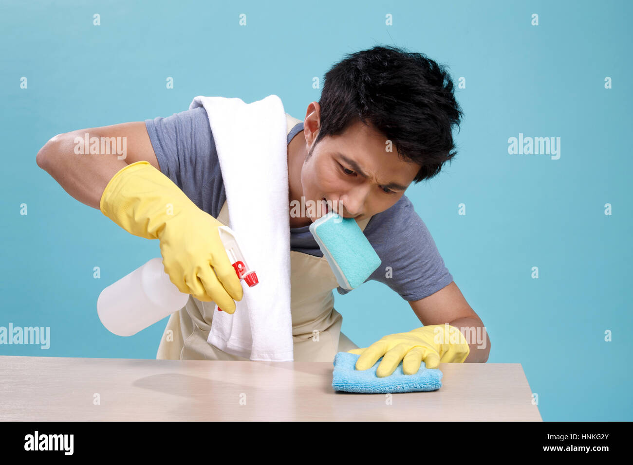 Young men do housework Stock Photo - Alamy
