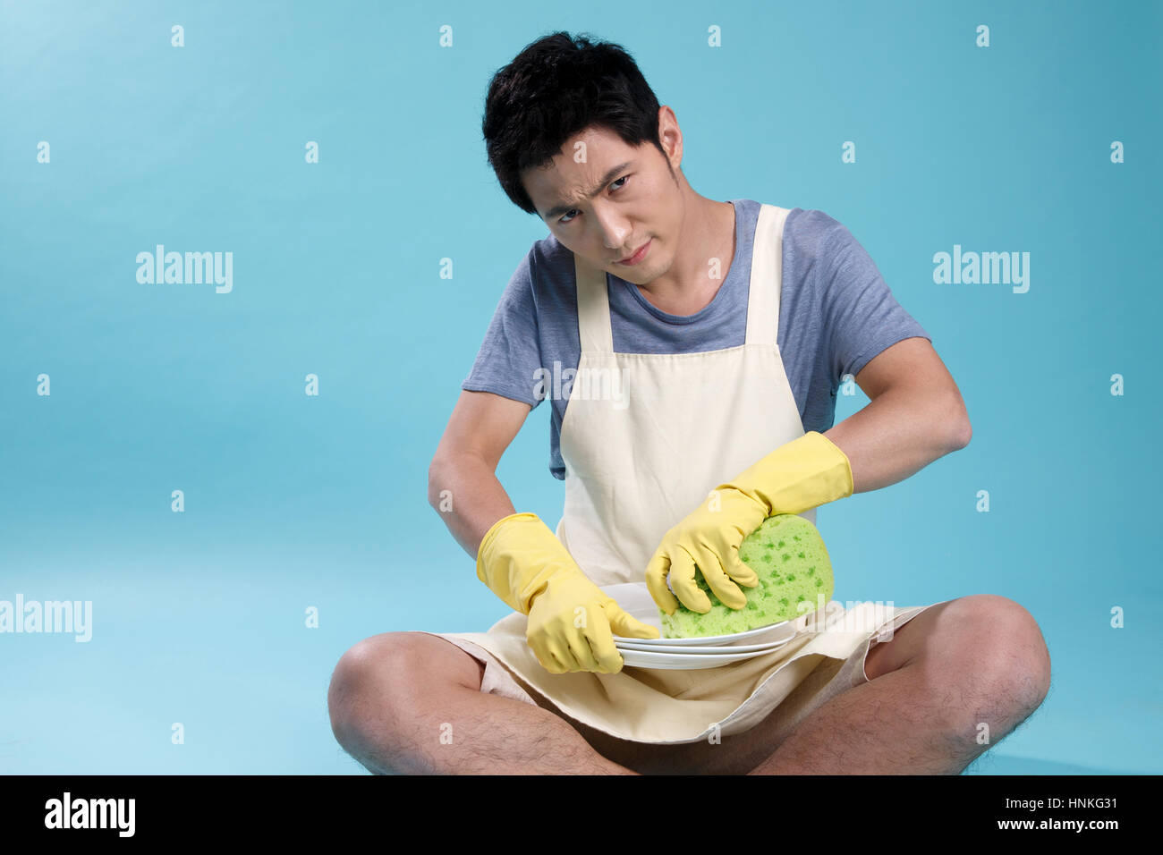 Young men do housework Stock Photo - Alamy