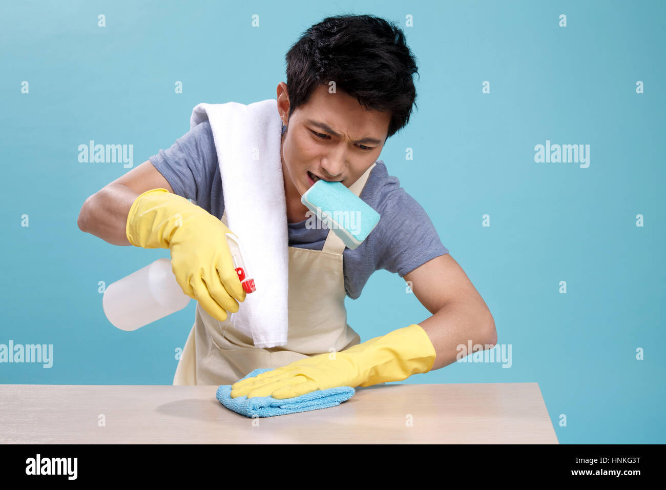Young men do housework Stock Photo - Alamy