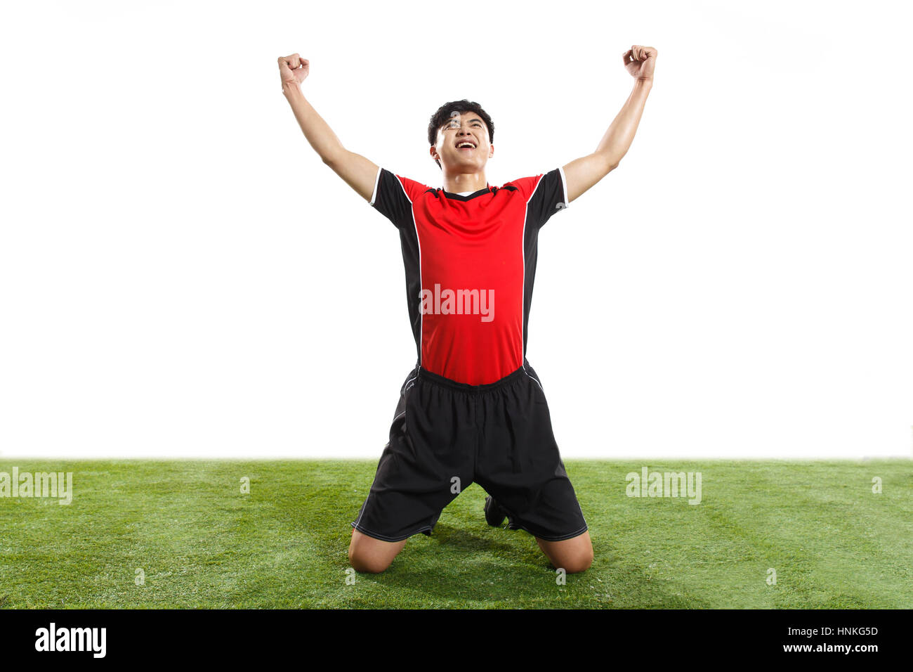 Football players celebrate success Stock Photo - Alamy