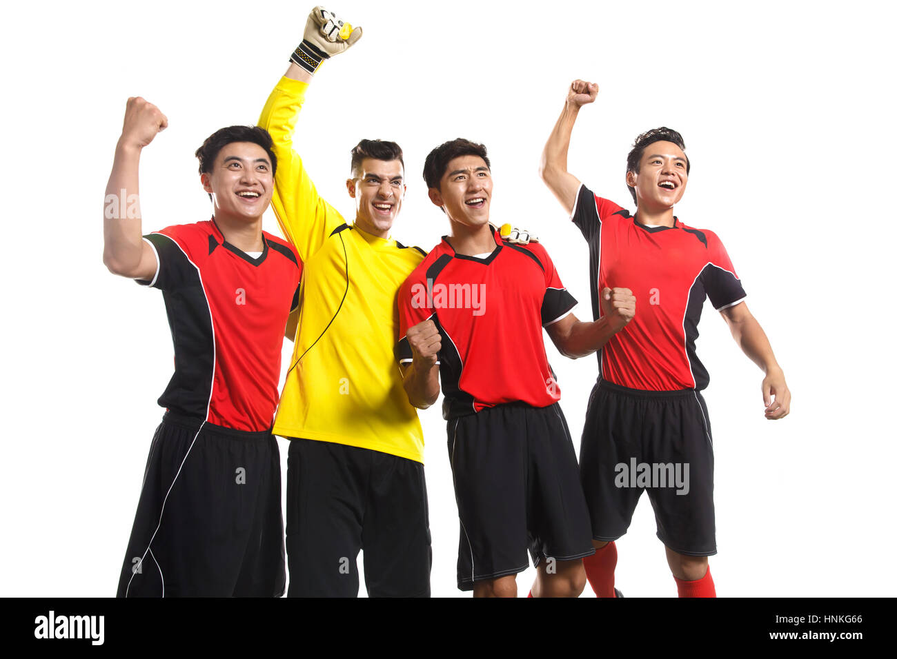 Football players celebrate success Stock Photo - Alamy