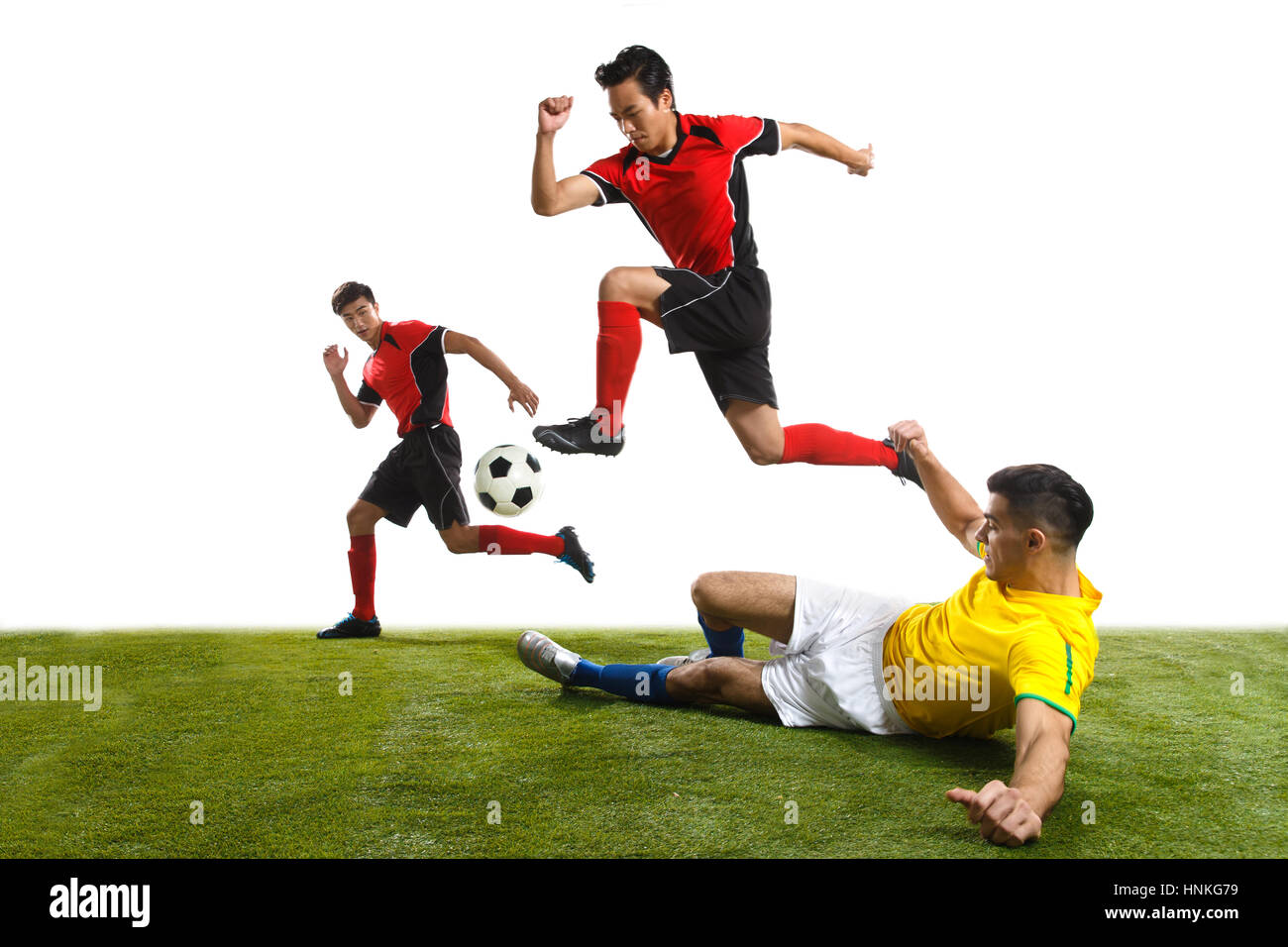 Football players are playing football Stock Photo - Alamy
