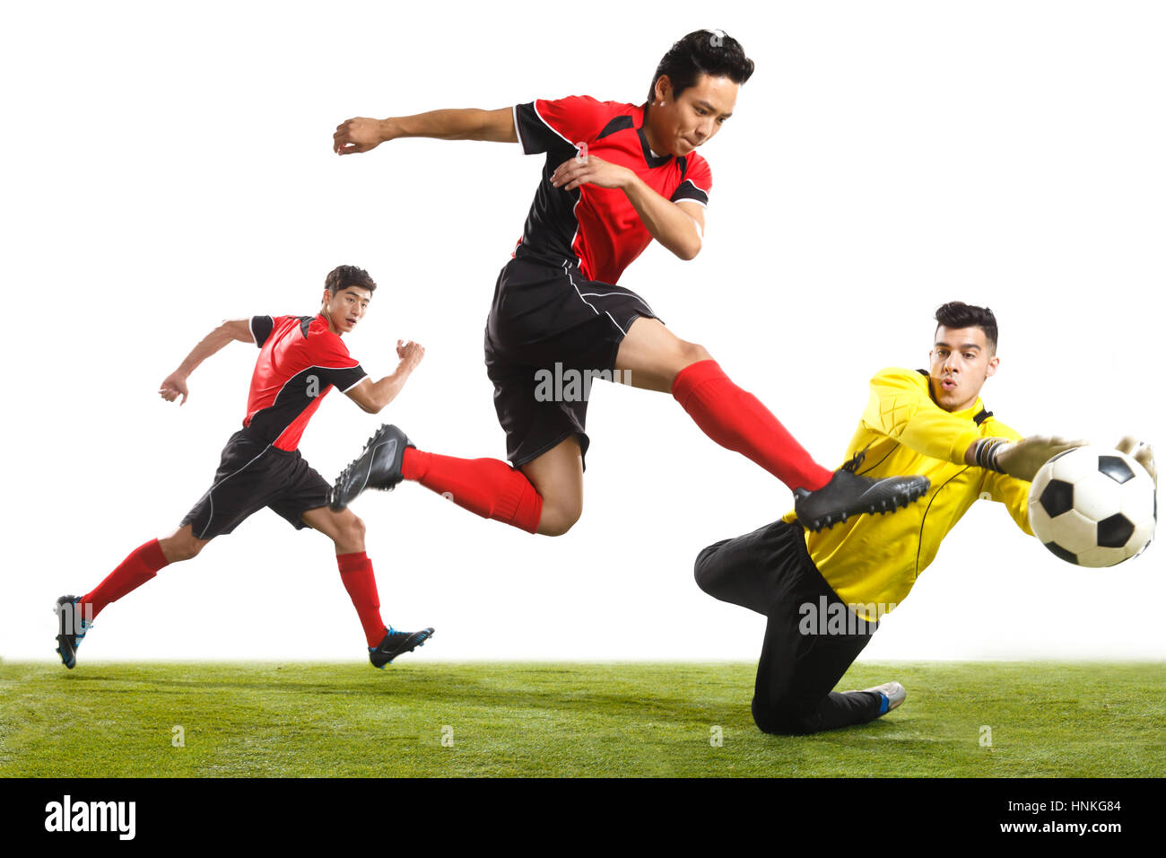 Football players are playing football Stock Photo - Alamy