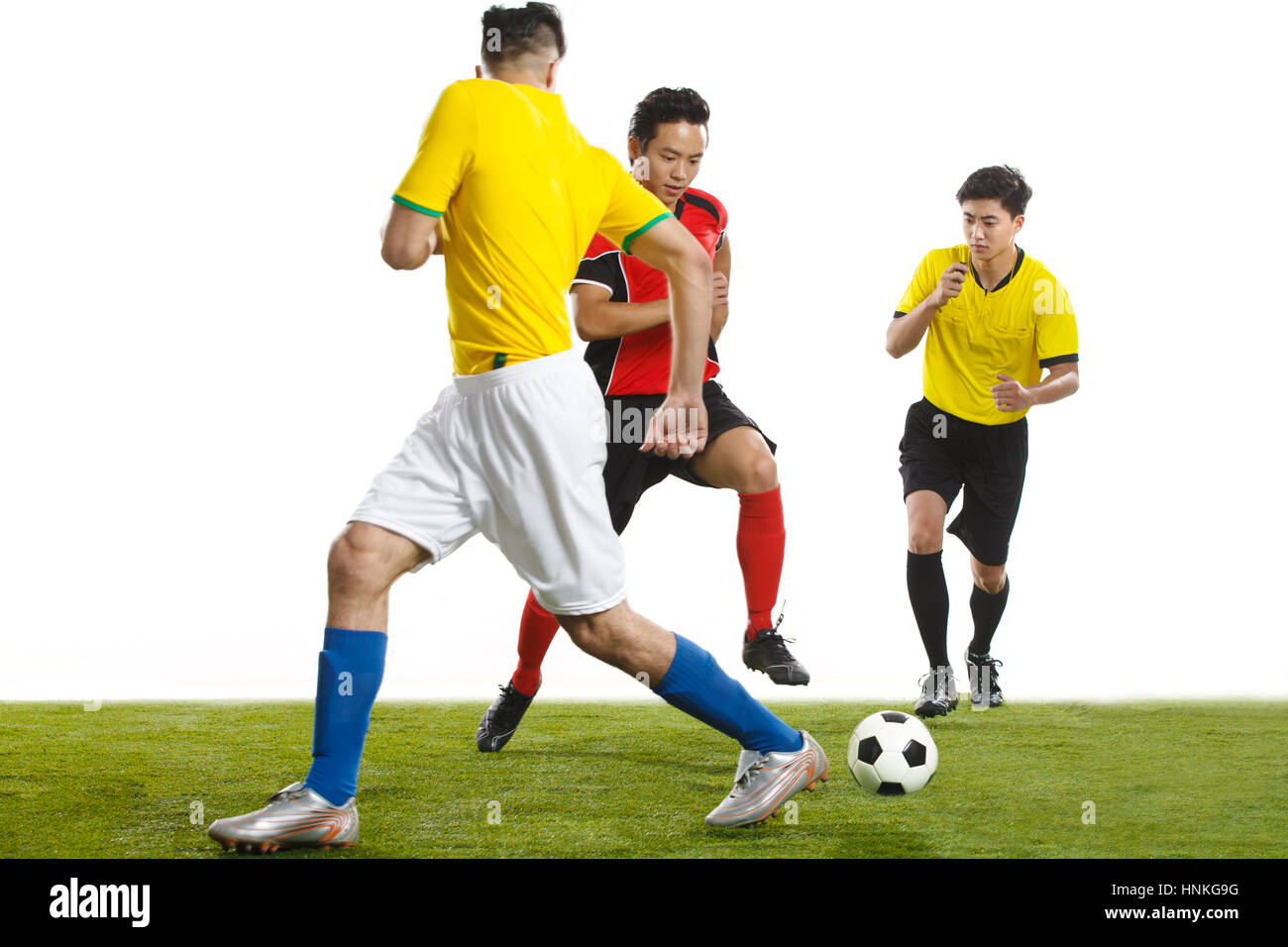 Football players are playing football Stock Photo - Alamy
