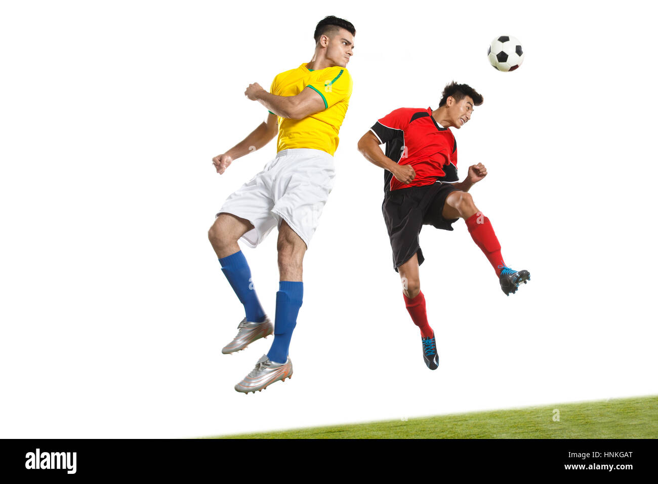 Football players are playing football Stock Photo - Alamy