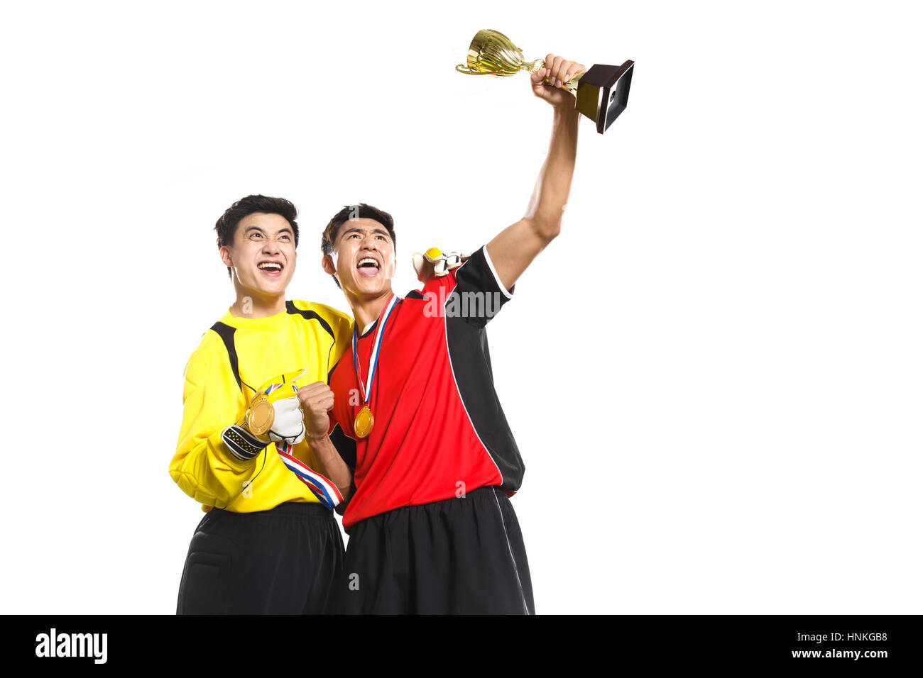 Football players celebrate success Stock Photo - Alamy