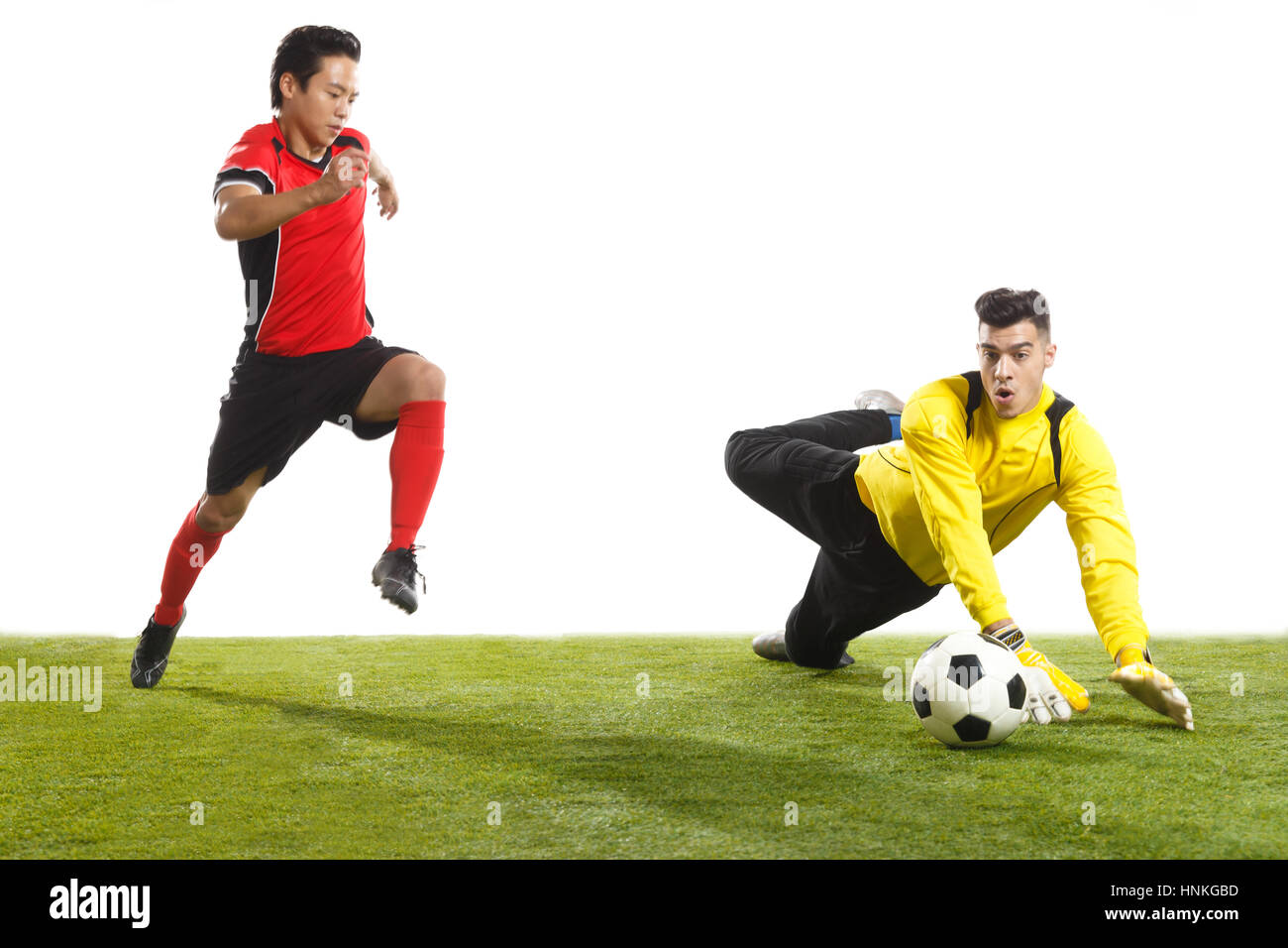 Football players are playing football Stock Photo - Alamy