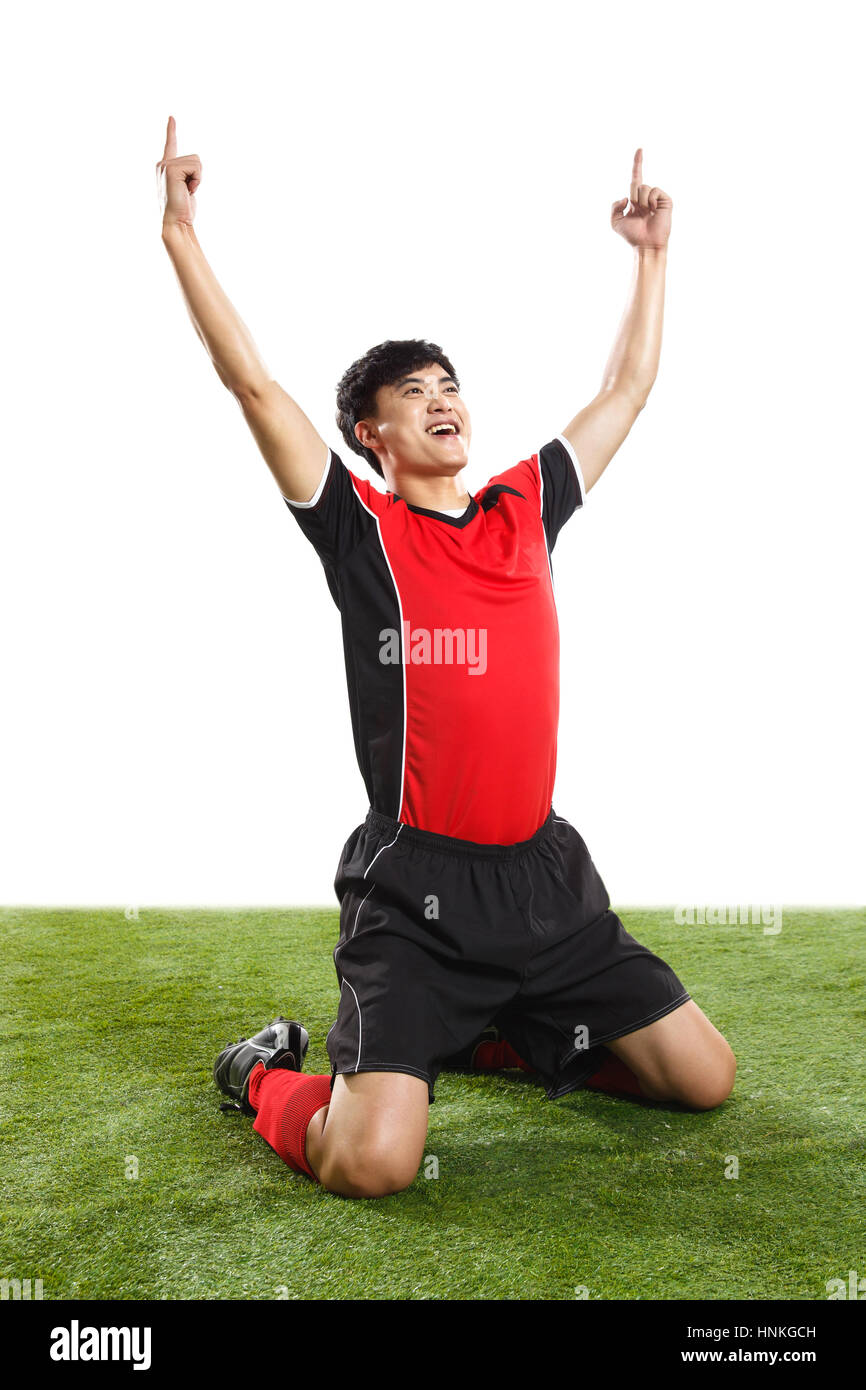 Football players celebrate success Stock Photo - Alamy