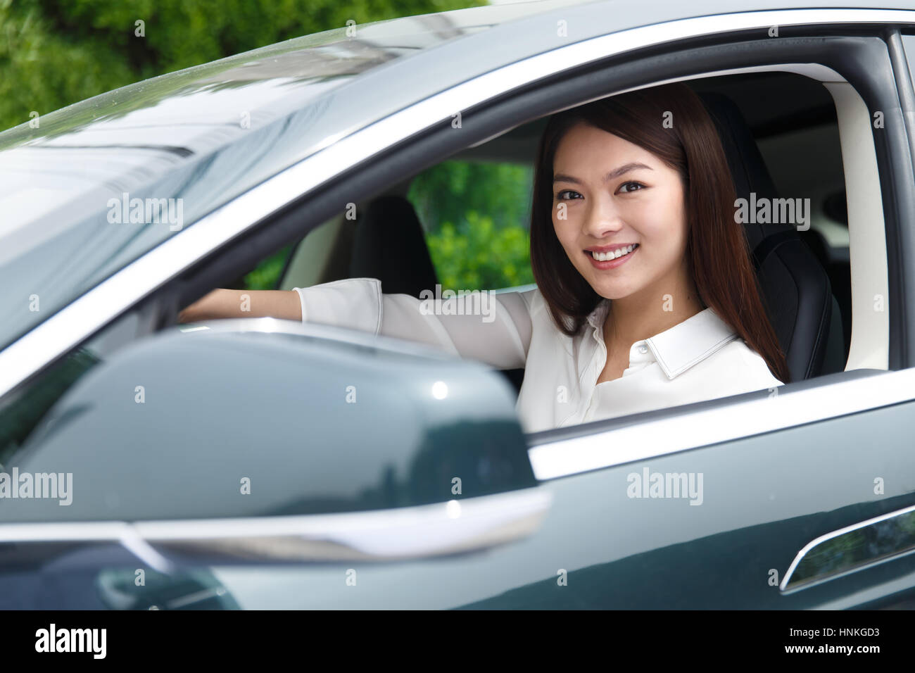 Young women drive hi-res stock photography and images - Alamy