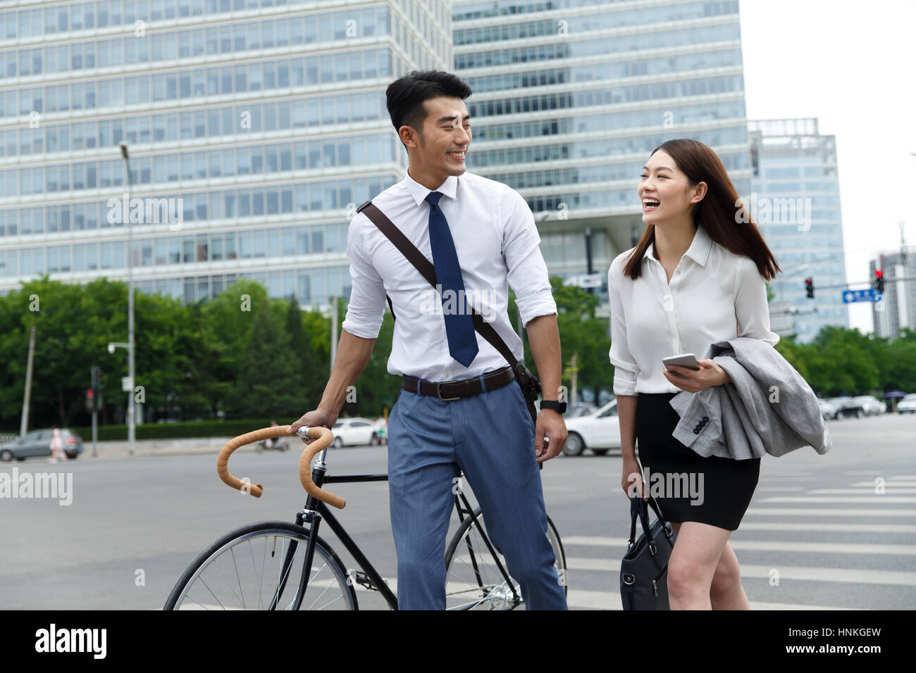 Three men crossing the road hi-res stock photography and images - Alamy