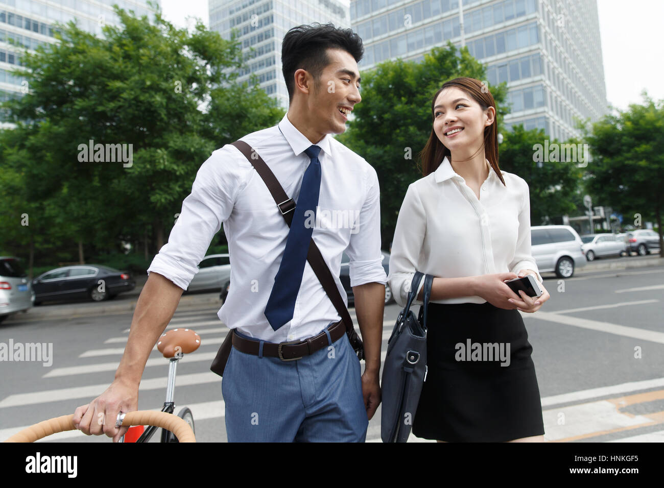 Three men crossing the road hi-res stock photography and images - Alamy
