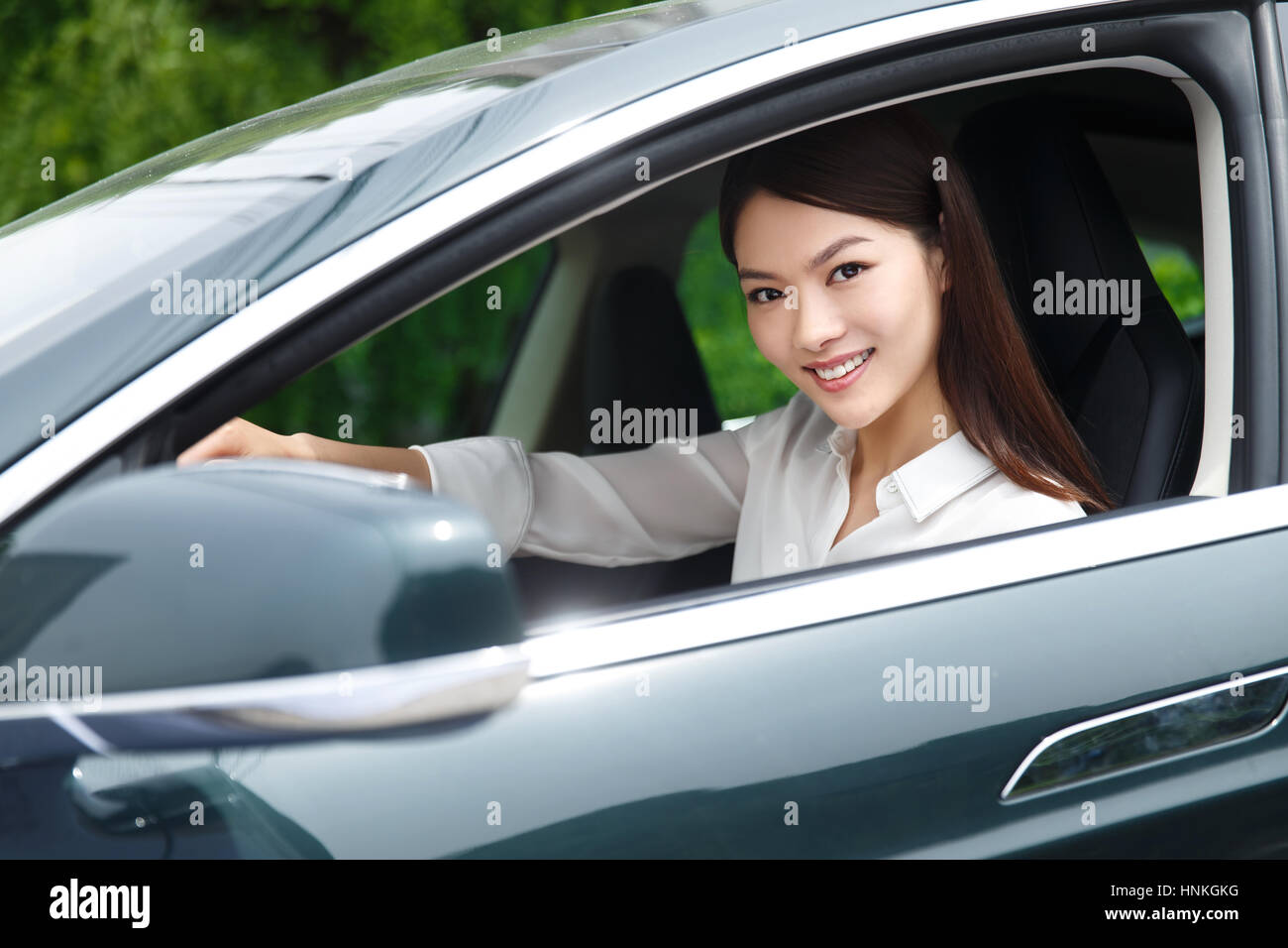 Young women drive Stock Photo - Alamy
